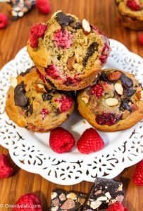 Healthy raspberry muffins with chocolate chunks, banana and almonds